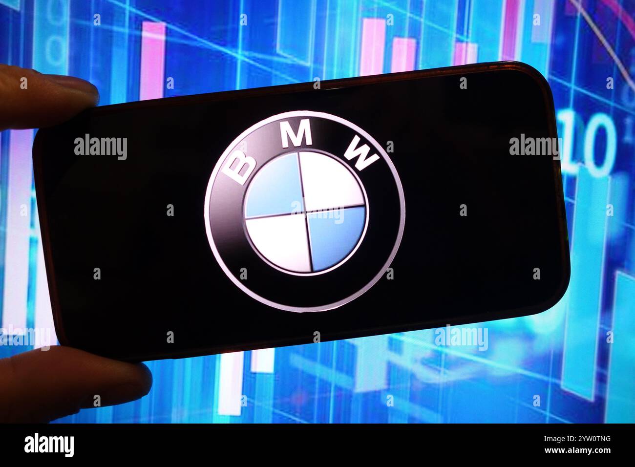 In this photo illustration, the BMW company logo is seen displayed on a ...