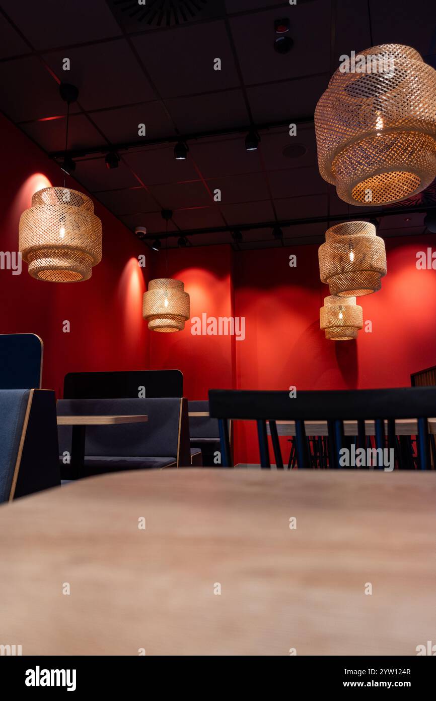 Inside the restaurant with red walls and orange lanterns. Picture teken ...