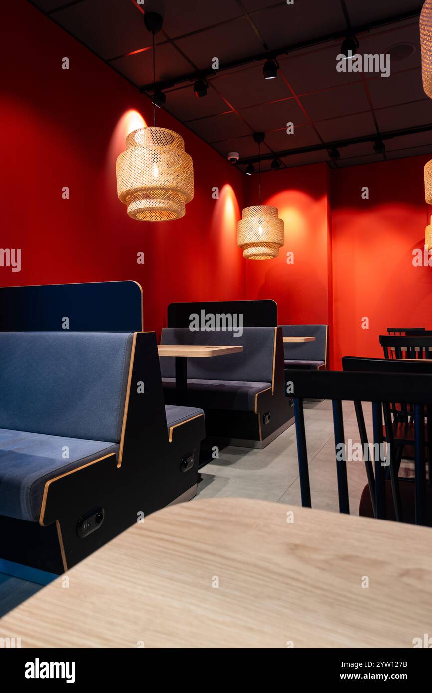 Inside the restaurant with red walls and orange lanterns. Picture teken ...