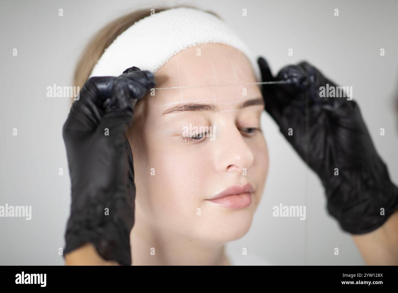 Expert eyebrow threading procedure for high-definition brows in beauty ...