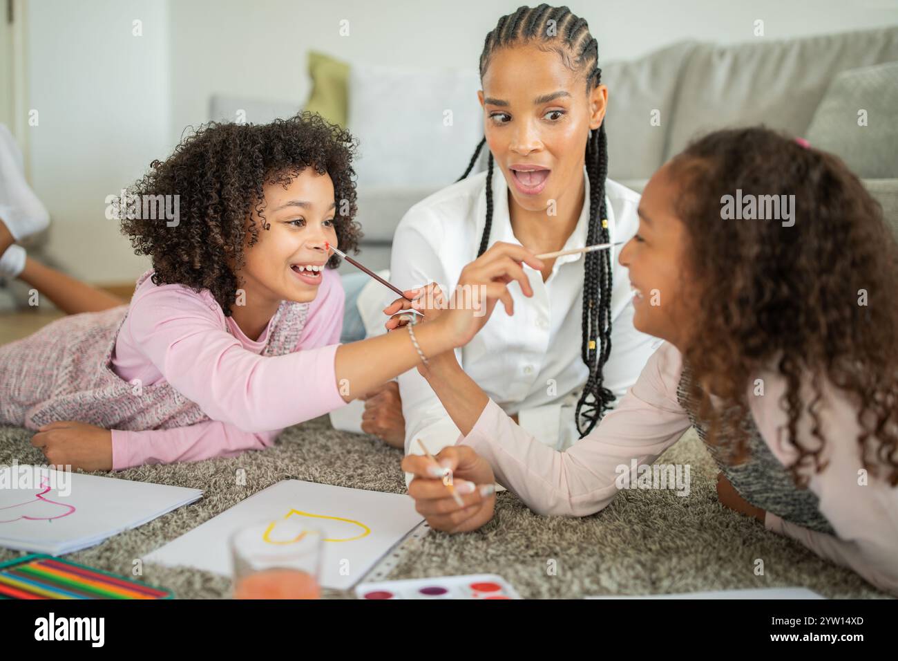 Family fun and creativity at home with kids enjoying art activities ...