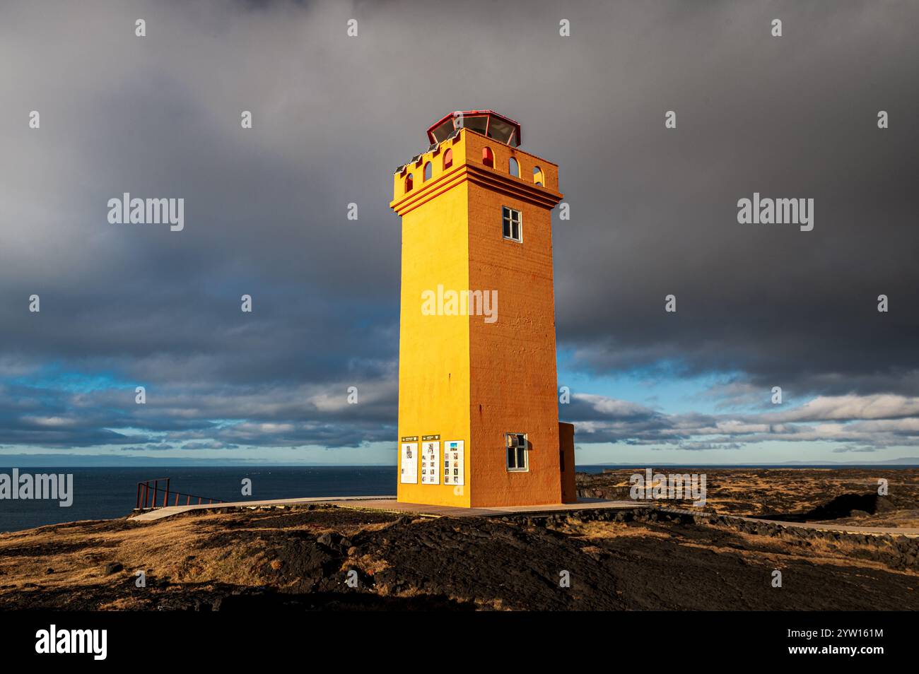 Orange lighthouse iceland sea coast hi-res stock photography and images ...