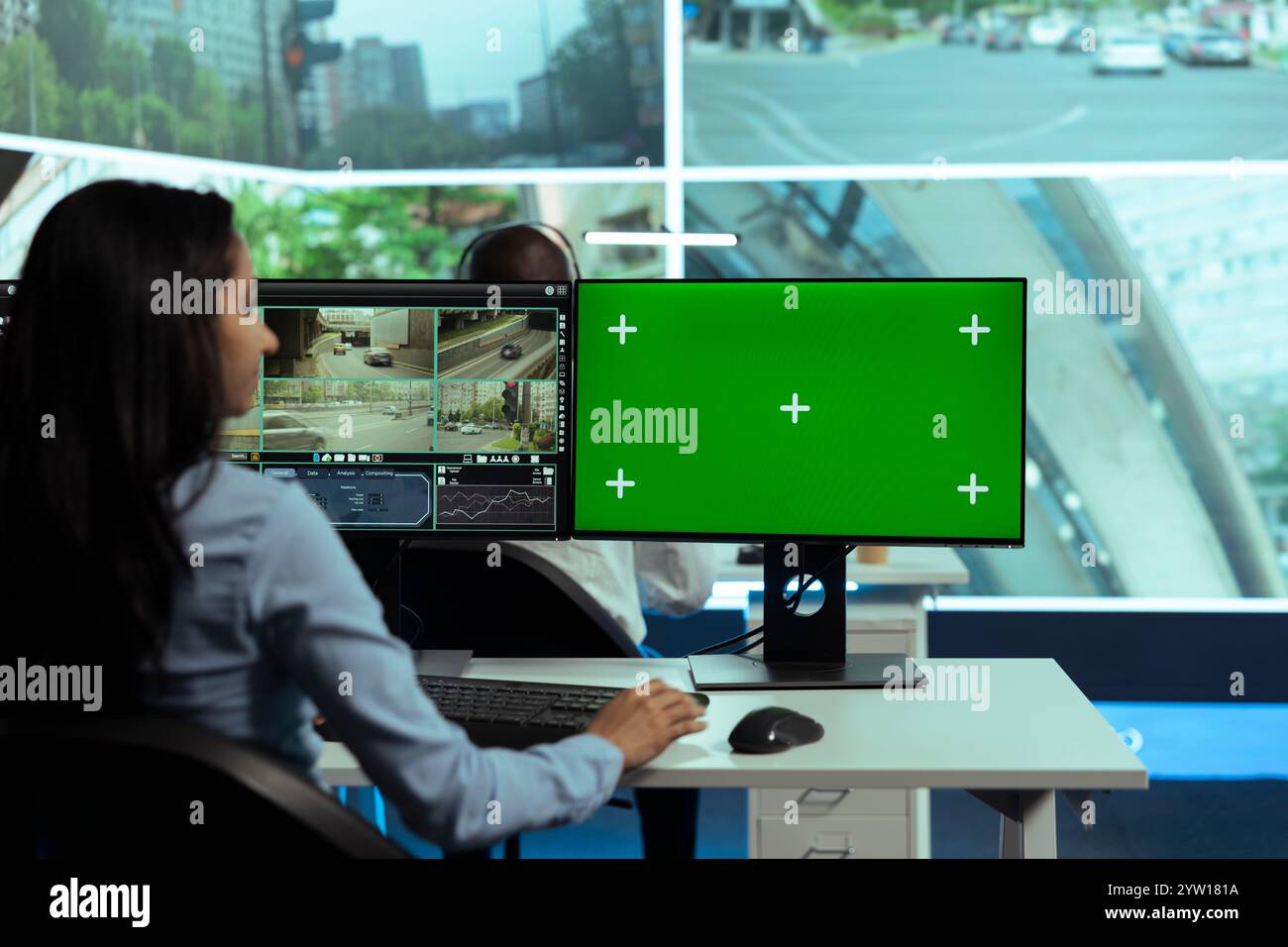 Indian Employee Works With Isolated Mockup Screen And Monitoring Traffic Using City