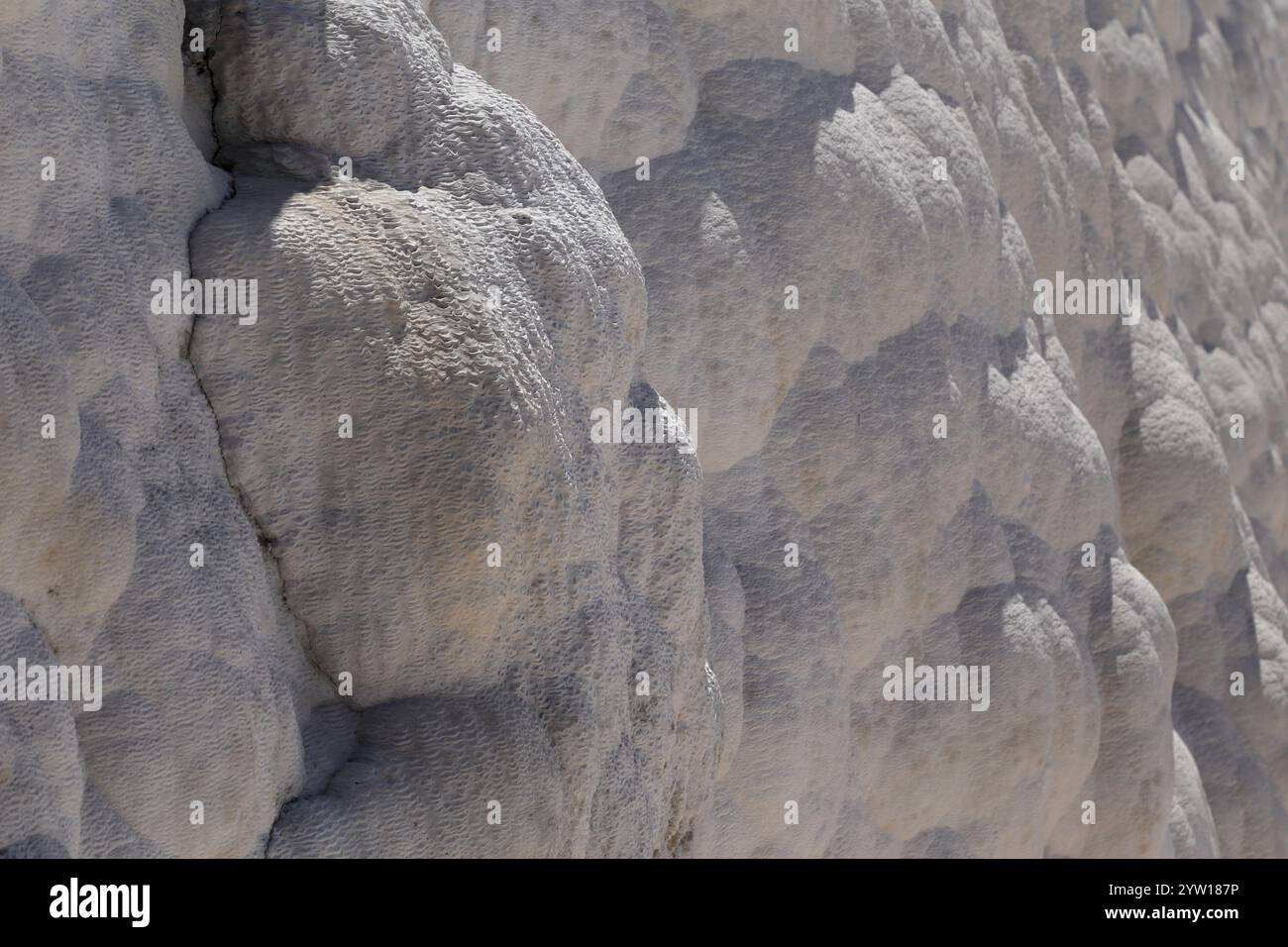 Detailed texture of eroded rocks in Pammukale, Turkey. Characteristic ...