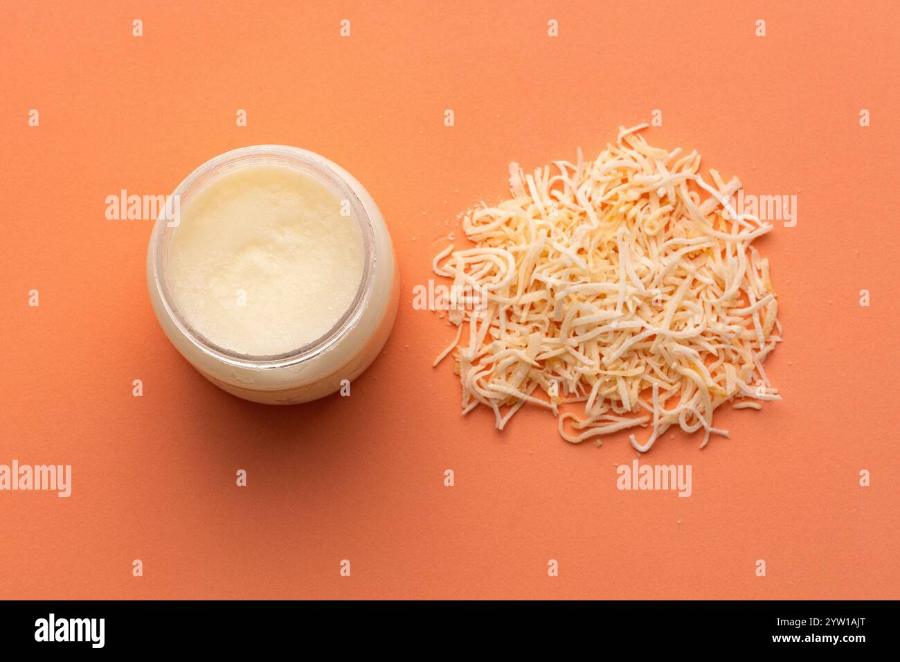 Virgin coconut oil in the container - Cocos nucifera Stock Photo - Alamy