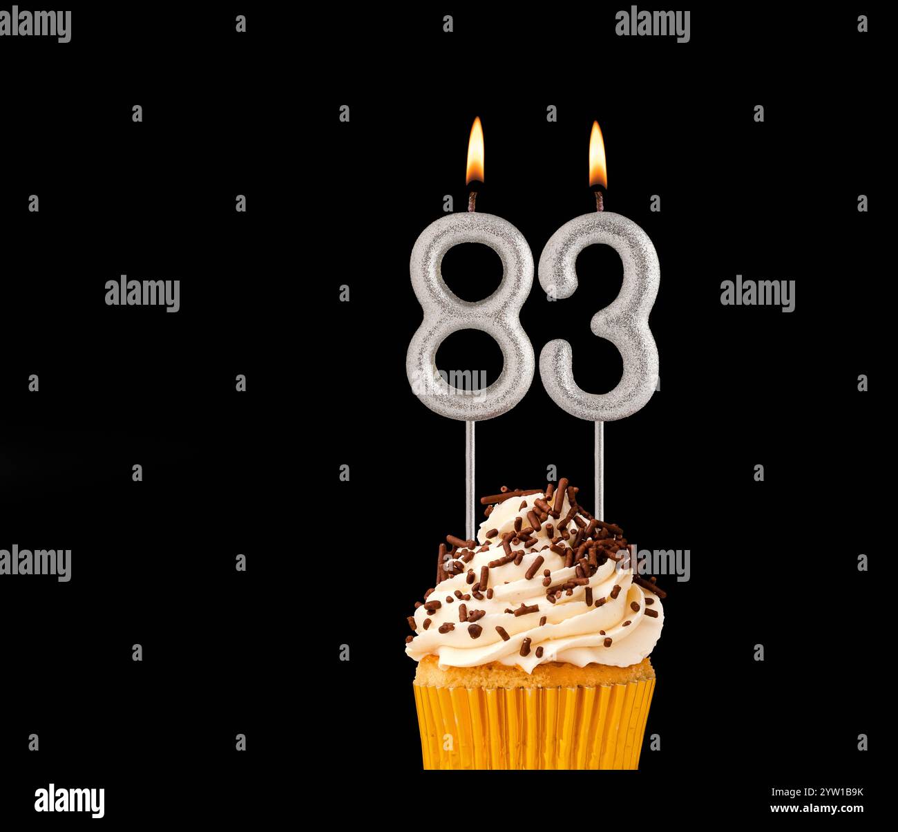 Birthday cupcake on black background - Number 83 shaped candles Stock ...