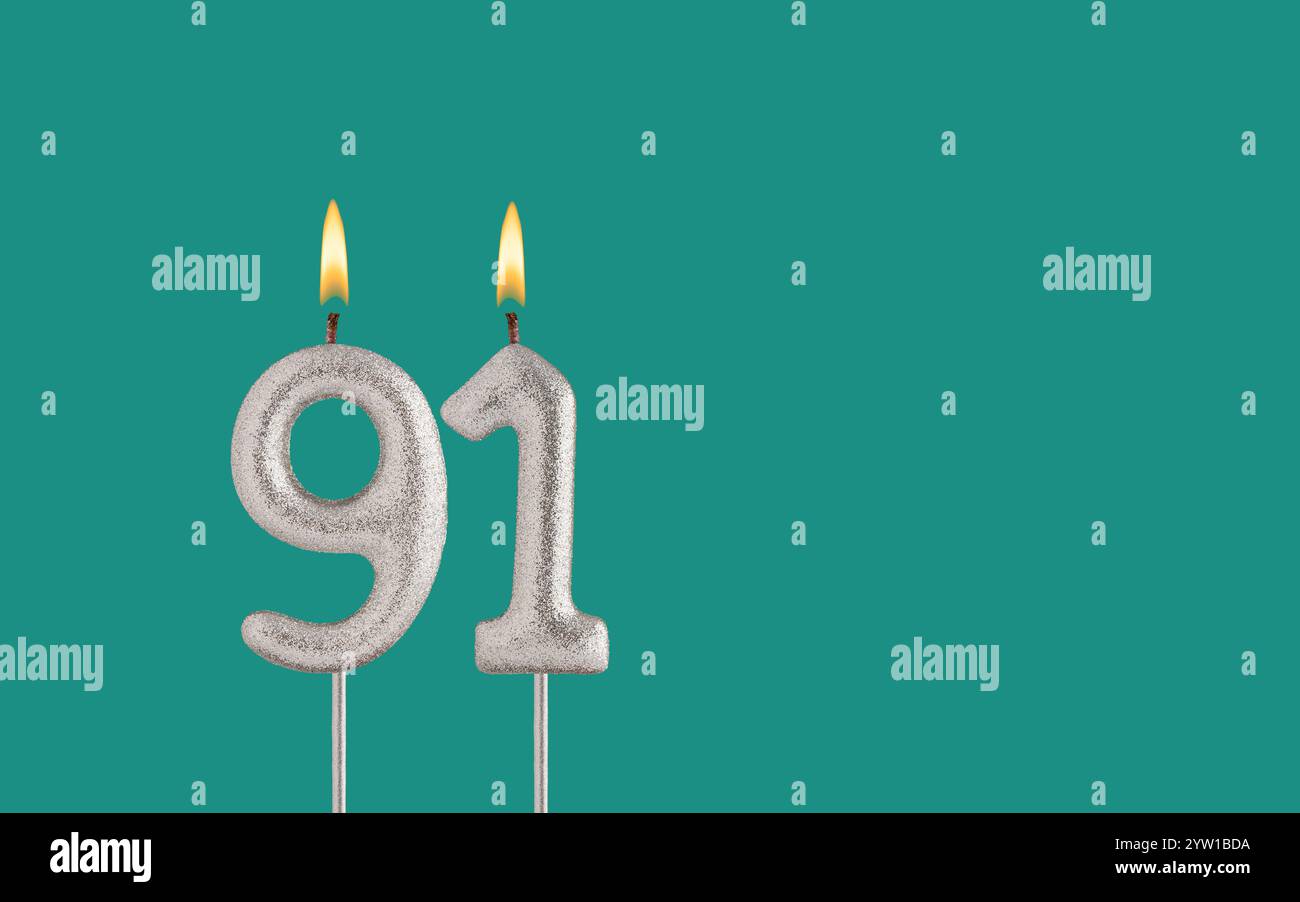 Birthday candle number 91 - Card on a green background Stock Photo - Alamy