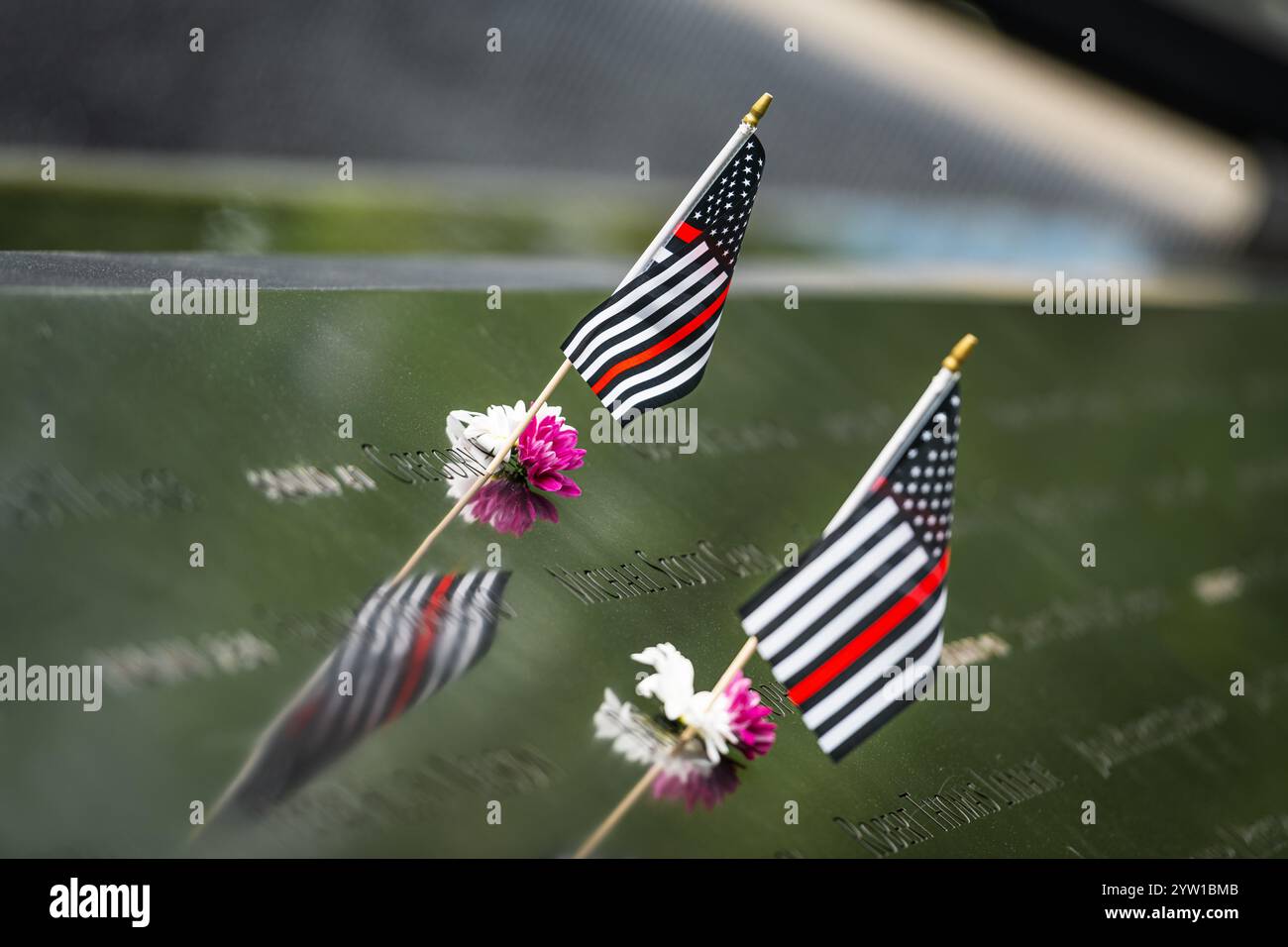 NEW YORK CITY - MAY 18, 2024: American flags and flowers placed at the ...