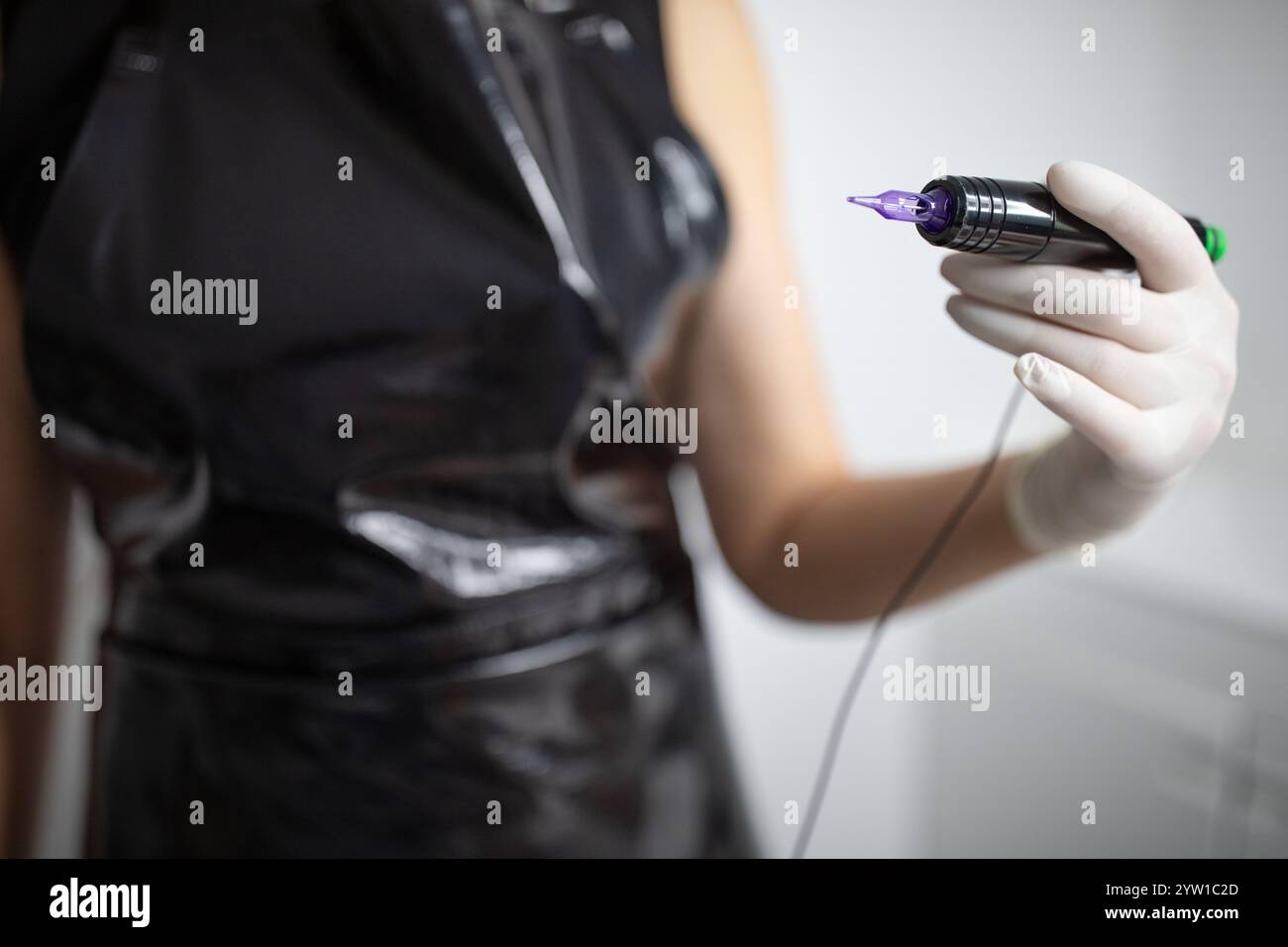 Expert makeup artist performing permanent procedure at beauty salon ...