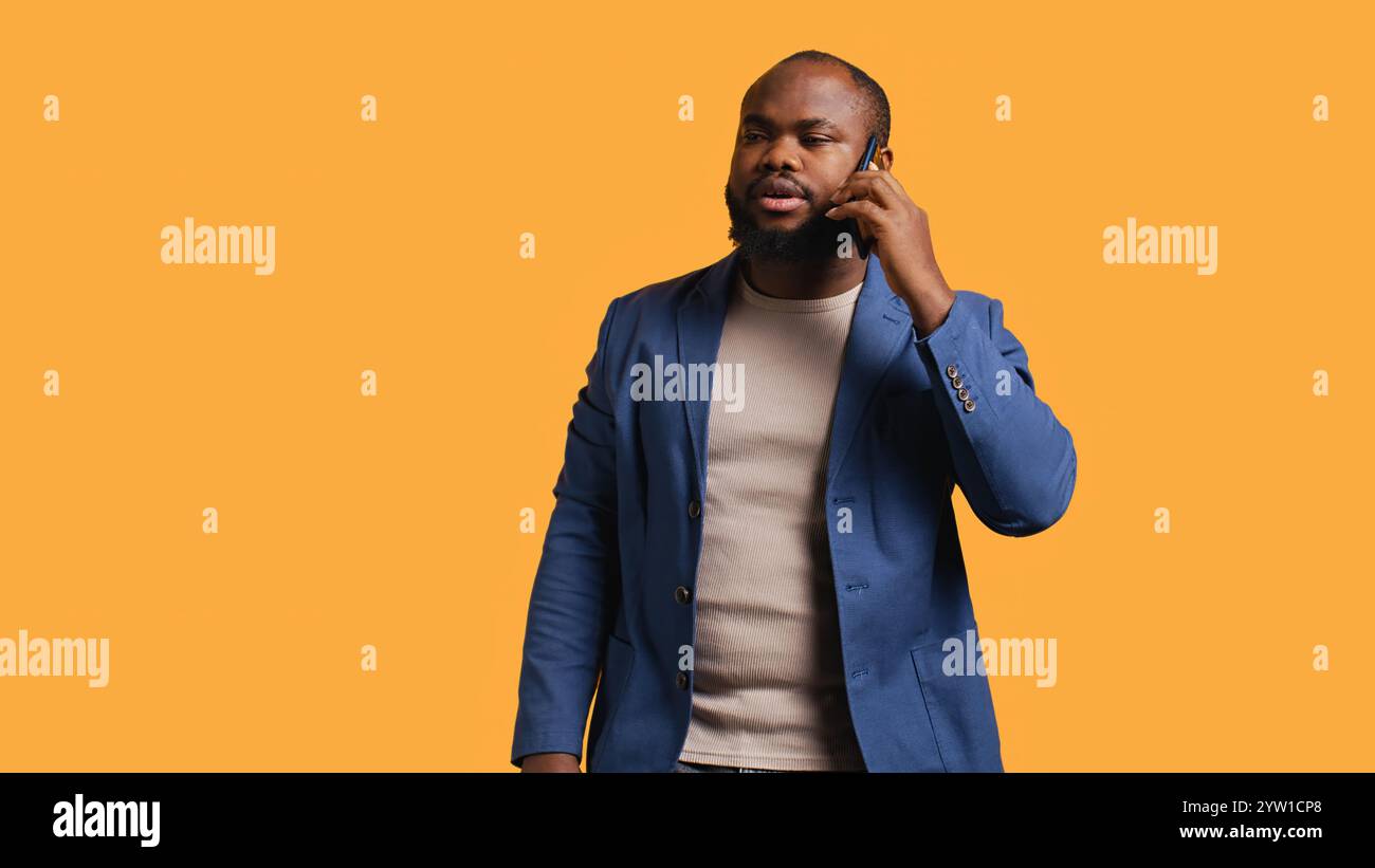 African american man having important phone call with business partner ...
