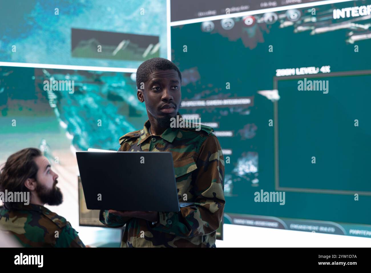 Commanding general of a division reviews warfare information within old ...