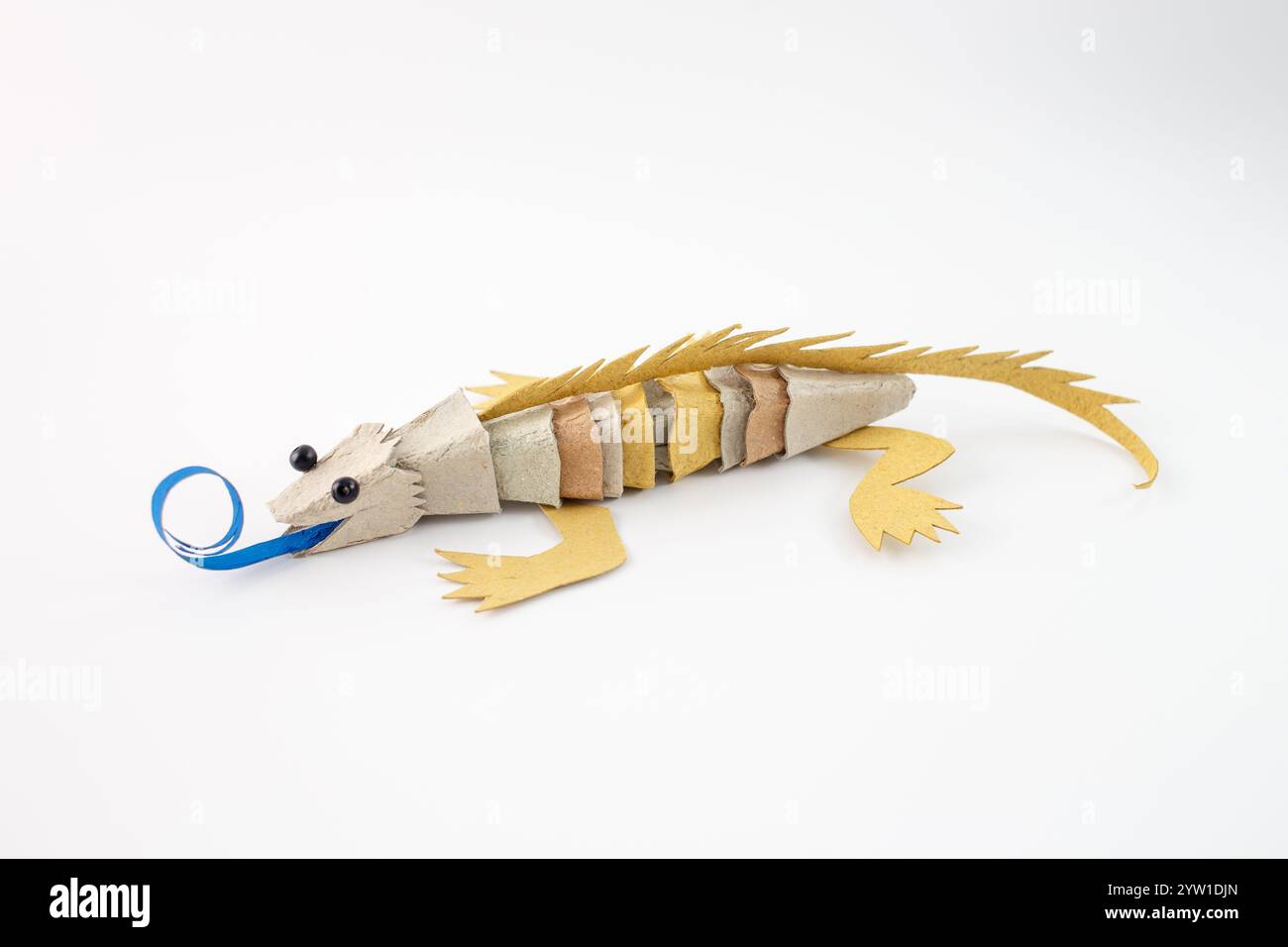 a colorful lizard from recycled cardboard and paper. DIY eco-friendly ...
