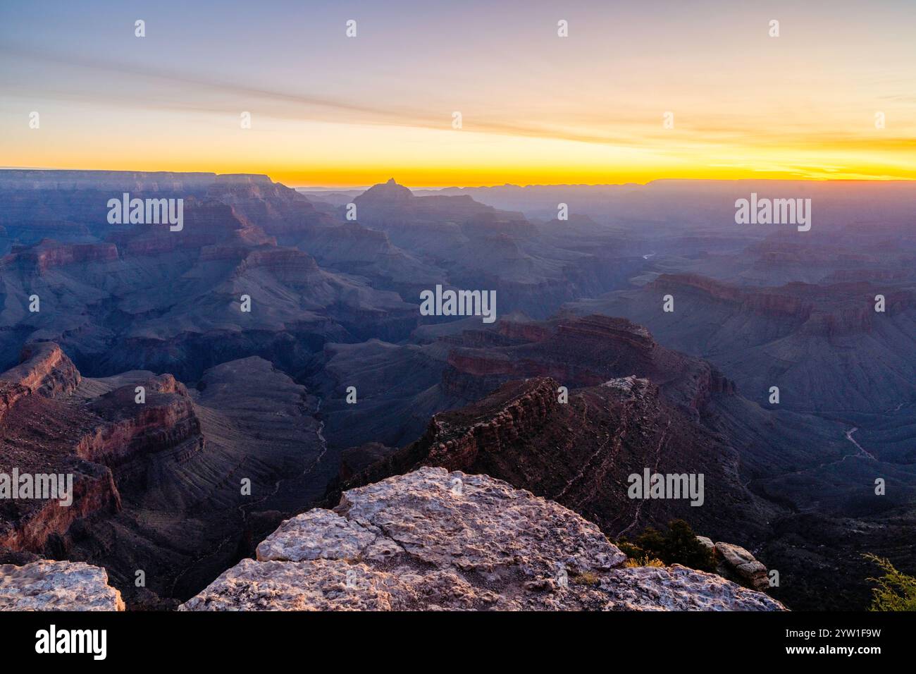 Sunrise over the Grand Canyon from Shoshone Point with Vishnu Temple in the distance; Grand ...