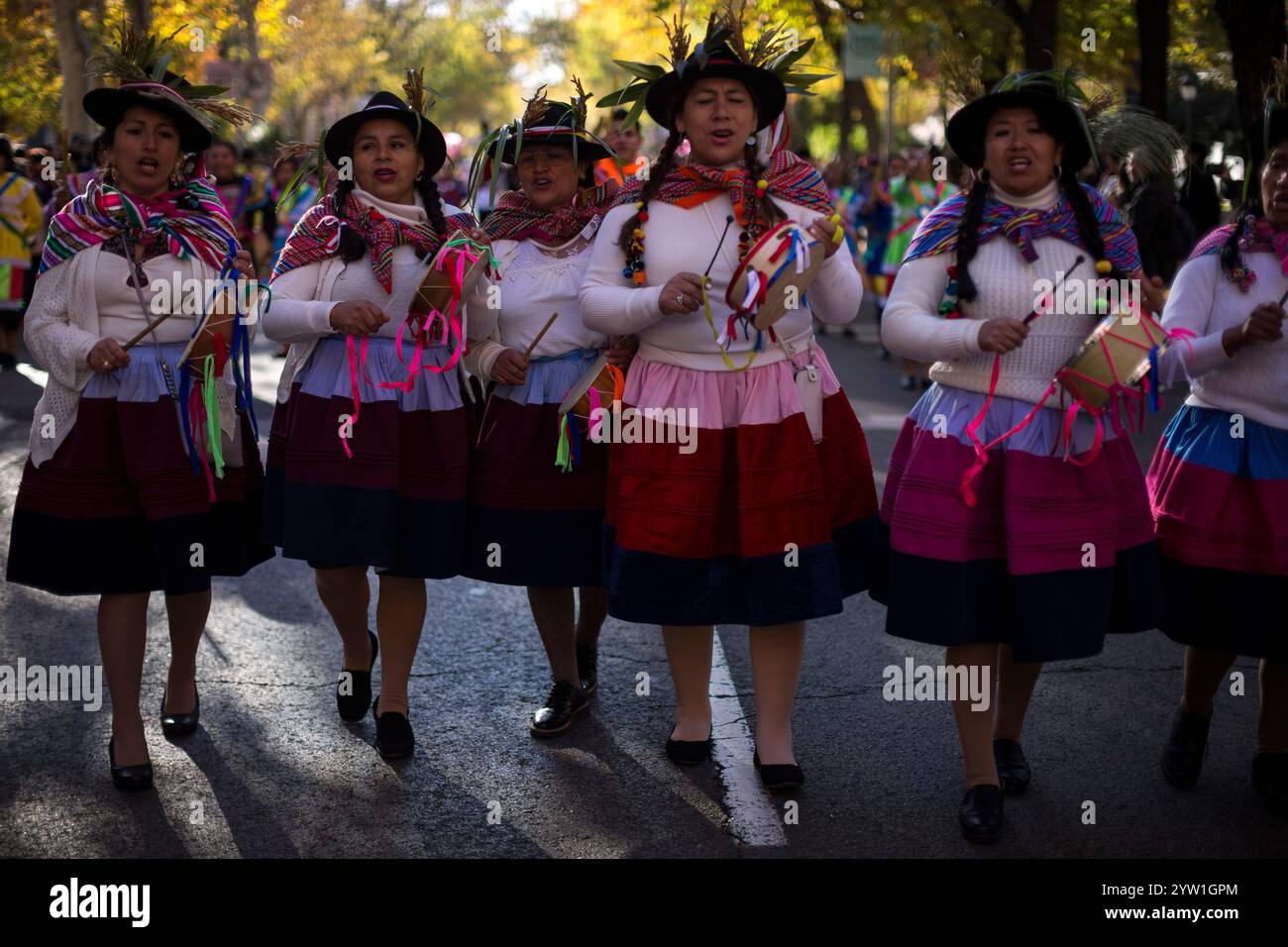 Madrid, Spain. 08th Dec, 2024. Women members of a Peruvian folkloric ...