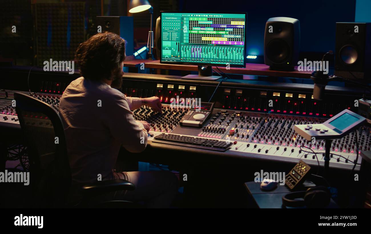 Sound technician mixes audio tracks hi-res stock photography and images ...