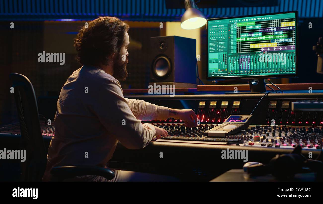 Sound technician mixes audio tracks hi-res stock photography and images ...