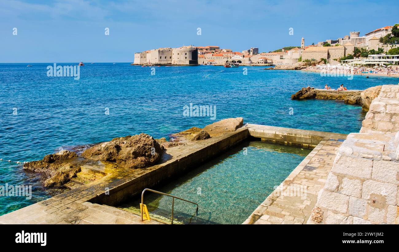Dubrovnik Croatia. Visitors can be seen enjoying the beach's natural ...