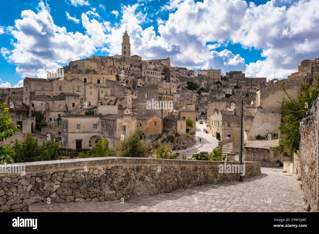 Wandering through the historic alleys of Matera in Puglia, Italy, where ...