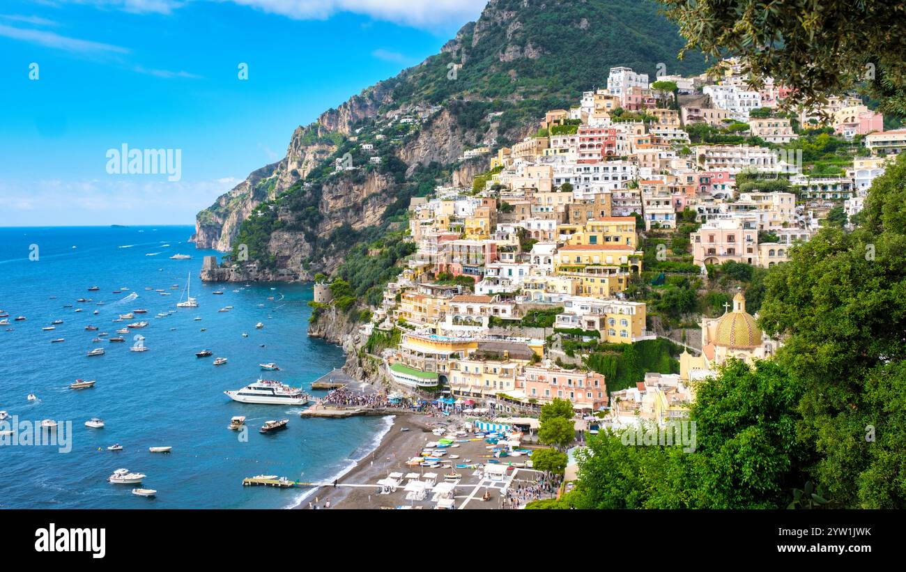 Vibrant houses cling to cliff edges in Positano Italy, overlooking the ...