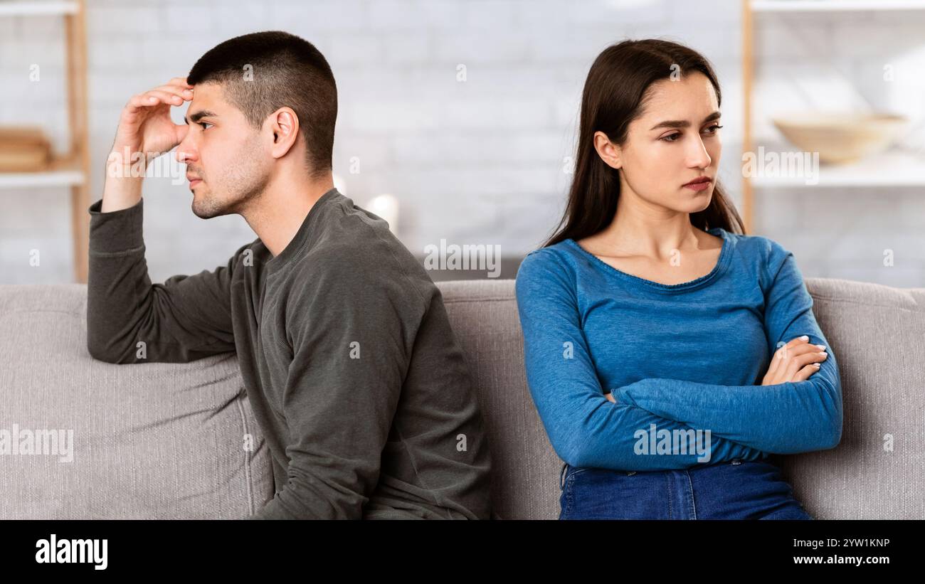 Couple ignoring each other after arguing during isolation Stock Photo ...