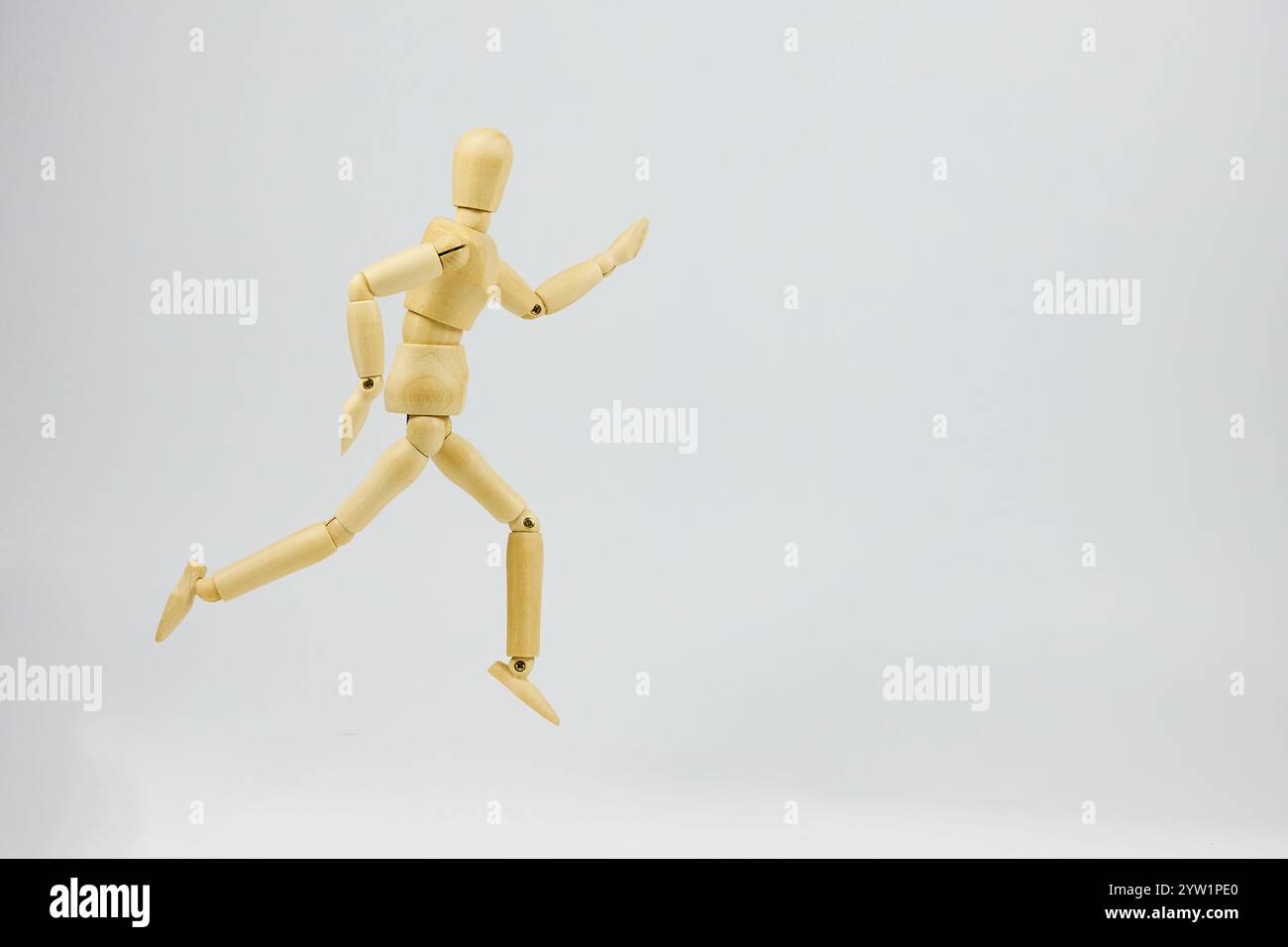 Articulated wooden figure representing the position of some type of ...
