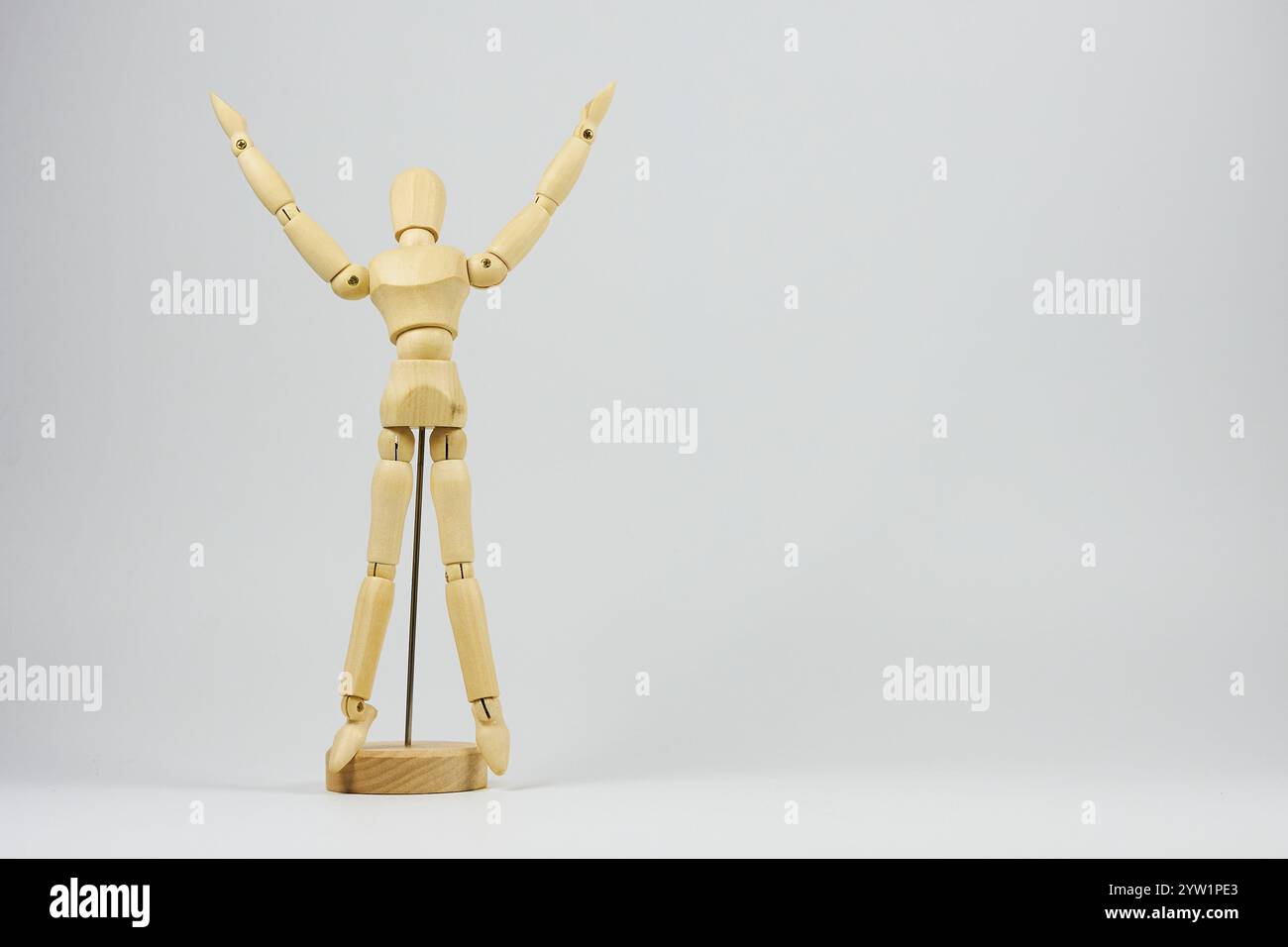 Articulated wooden figure representing the position of some type of ...