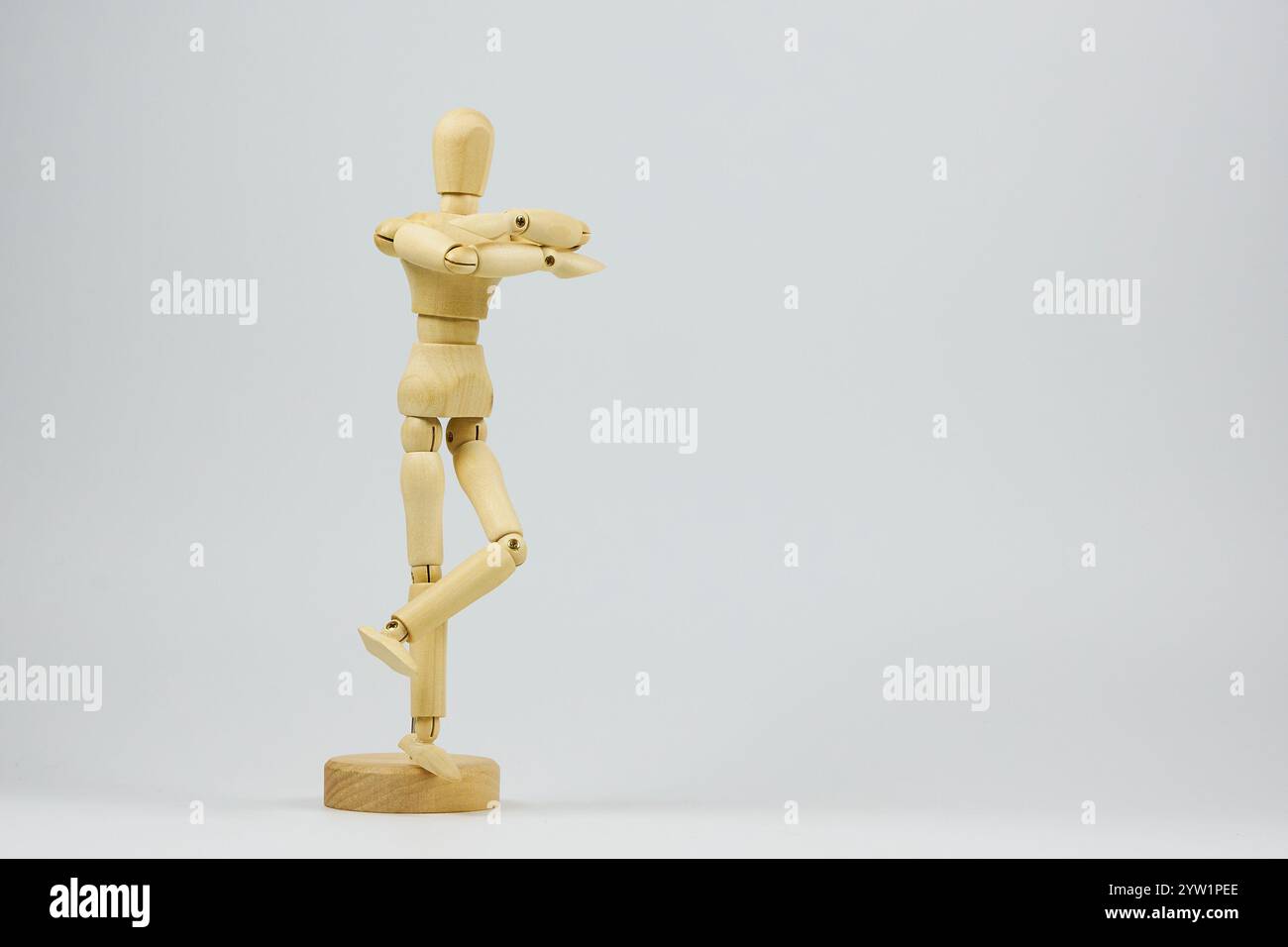 Wooden figure representing various dance movements demonstrating joy ...