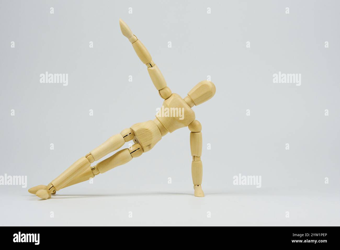 Articulated wooden figure representing the position of some type of ...