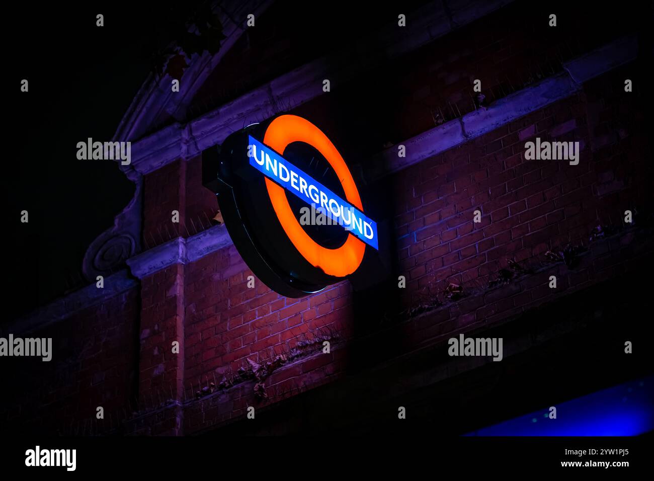 The midnight view of roundel, a symbol of London's public transport, UK ...