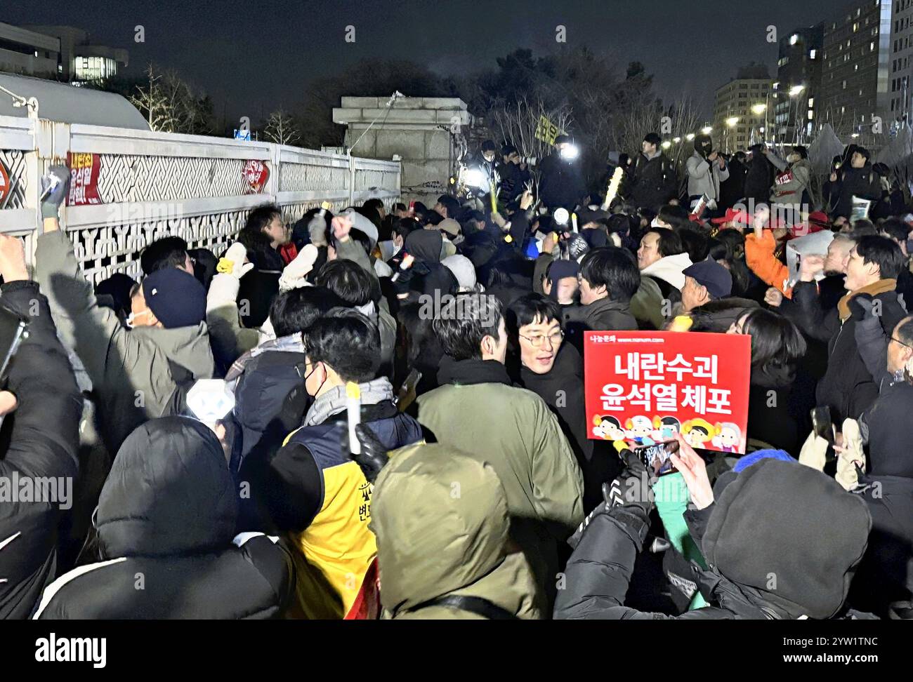 South Korean people gather around the National Assembly of the Republic ...