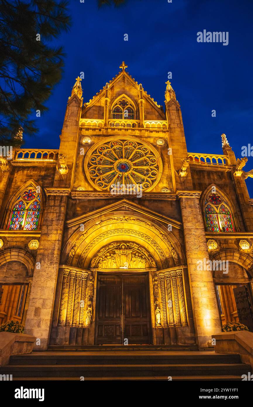 medieval Catholic cathedral in European style in French village in Ba ...