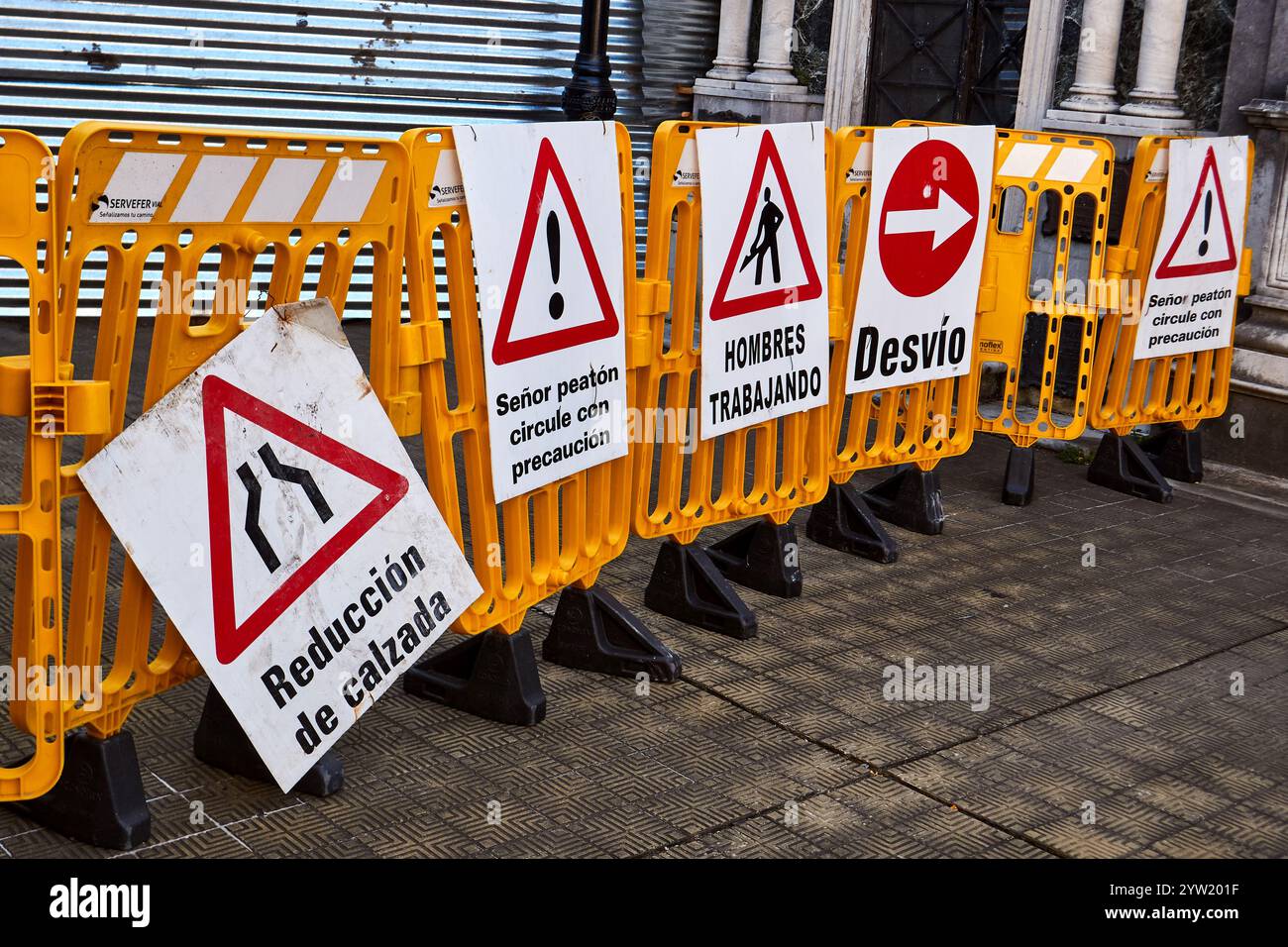 Traffic signs indicating a lane closure due to roadworks Stock Photo ...