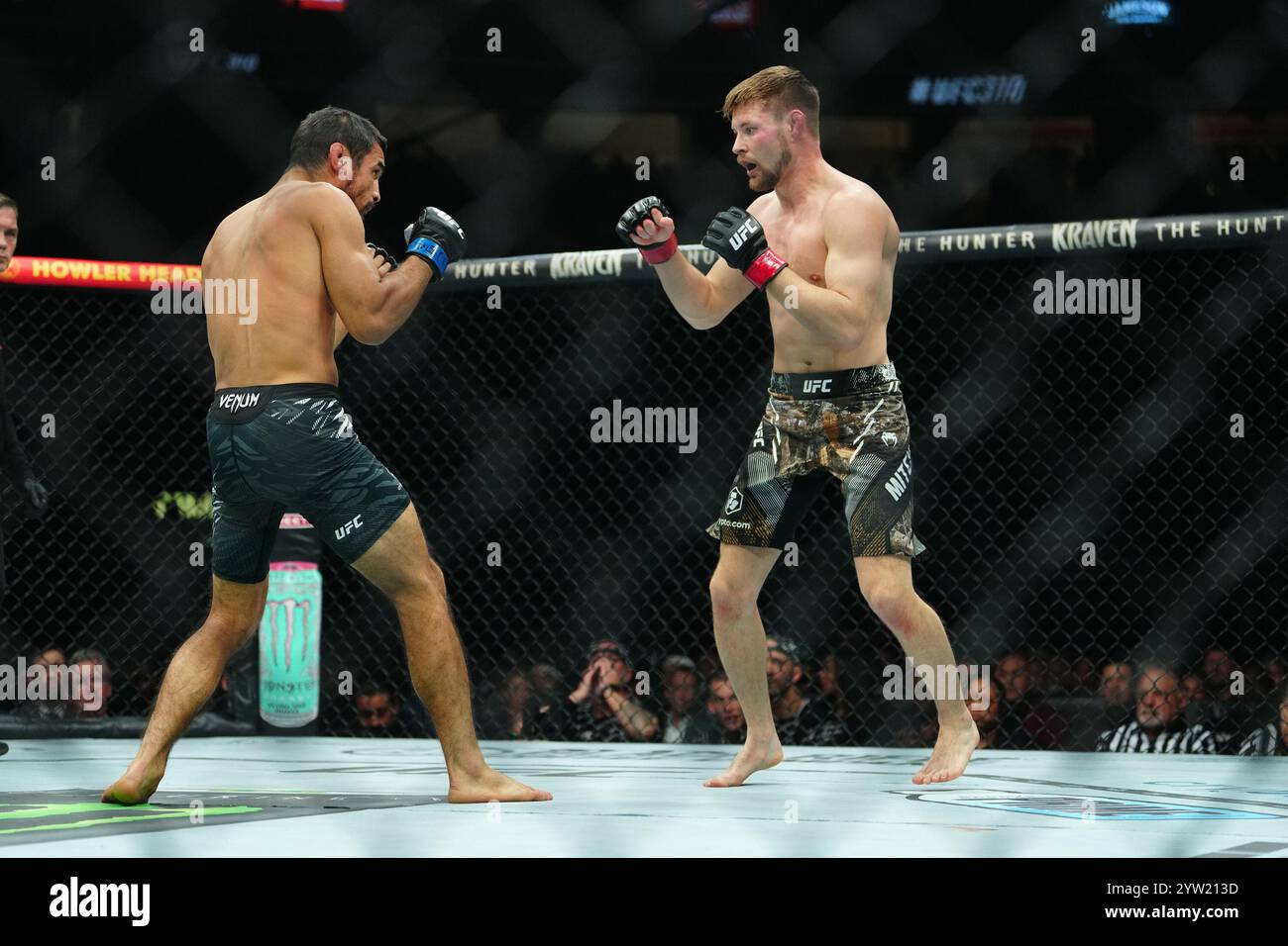 LAS VEGAS, NV -DECEMBER 7:Bryce Mitchell and Kron Gracie meet in the octagon for a 3-round bout ...