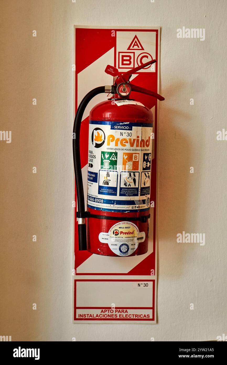 Fire extinguisher on the wall Stock Photo - Alamy
