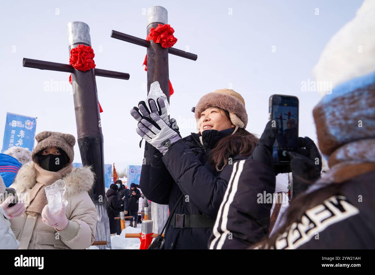 Harbin,China.7th December 2024. The 5th Harbin Ice Harvesting Festival ...