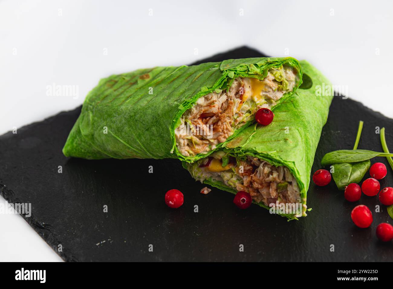 Healthy food, fresh pita roll with grilled chicken, vegetables and ...