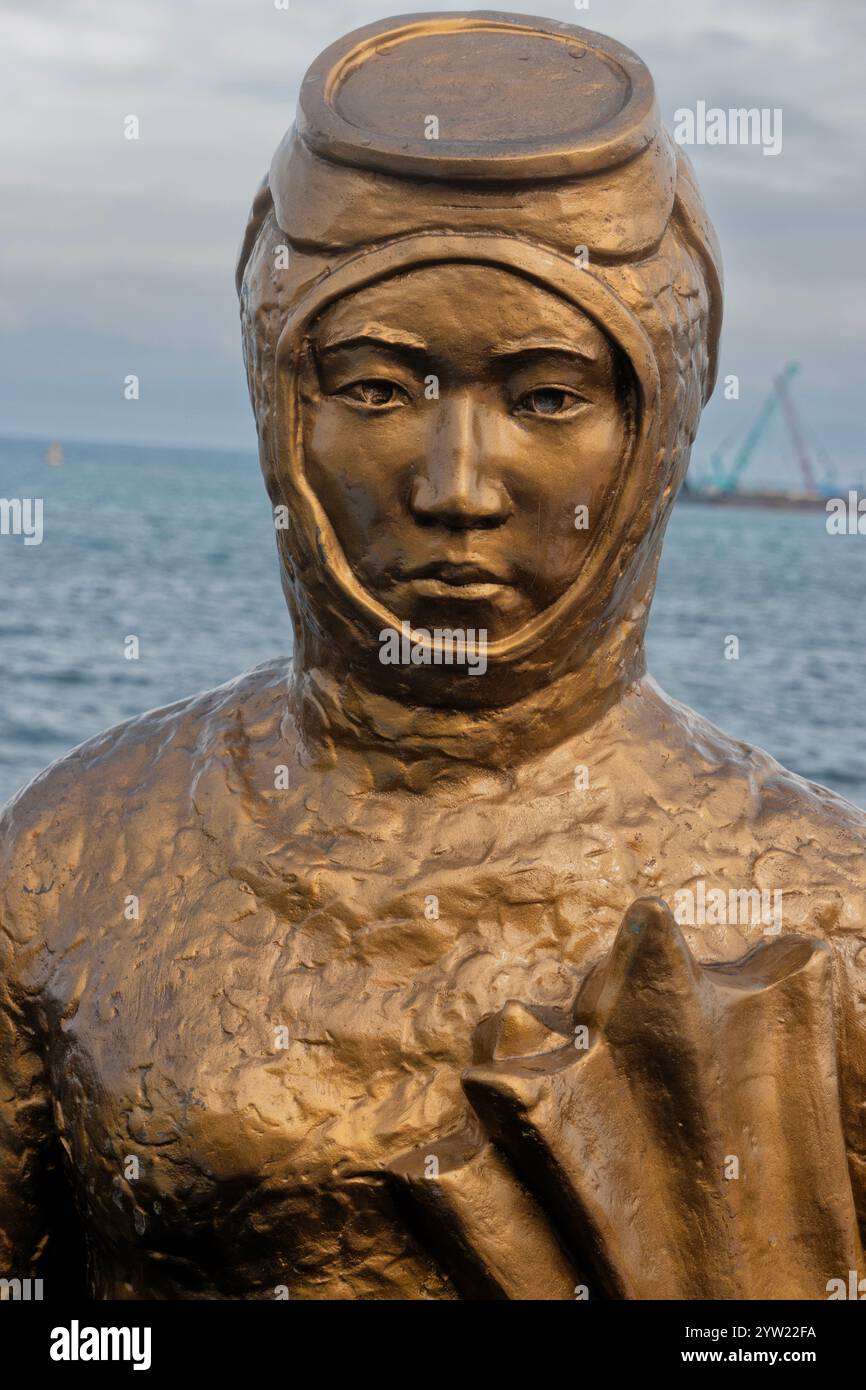Haenyo woman diver statue along the Jeju Olle Trail, Jeju Island, South ...