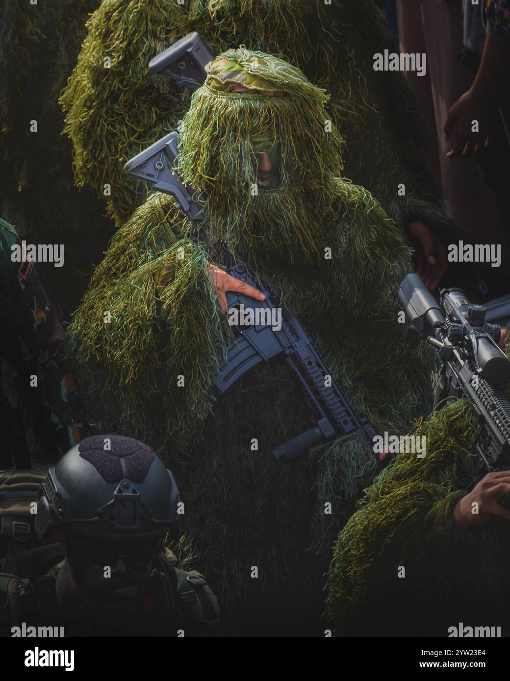 Balikpapan, Indonesia - November 9th, 2024. The snipers, camouflaged in ...