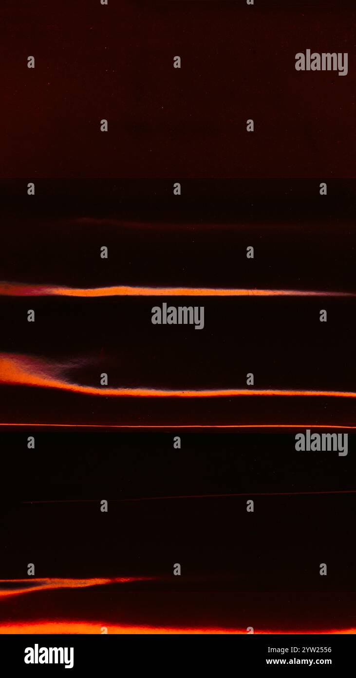 Damaged film overlay. Light leak. Ruined piece black fire orange red ...