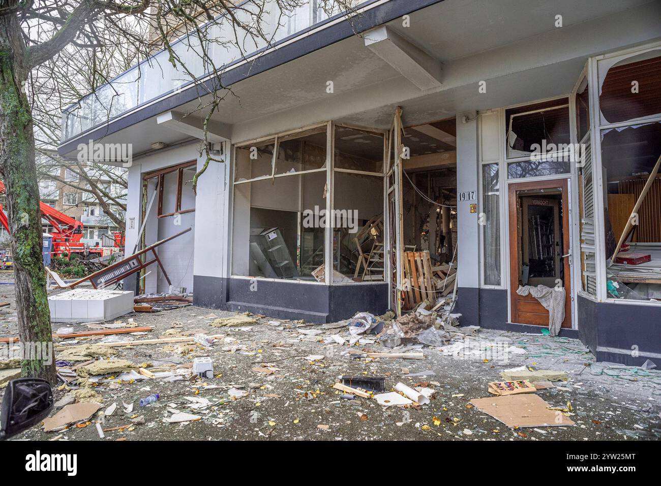 Burnt out shops beneath the residential apartments in the aftermath of ...