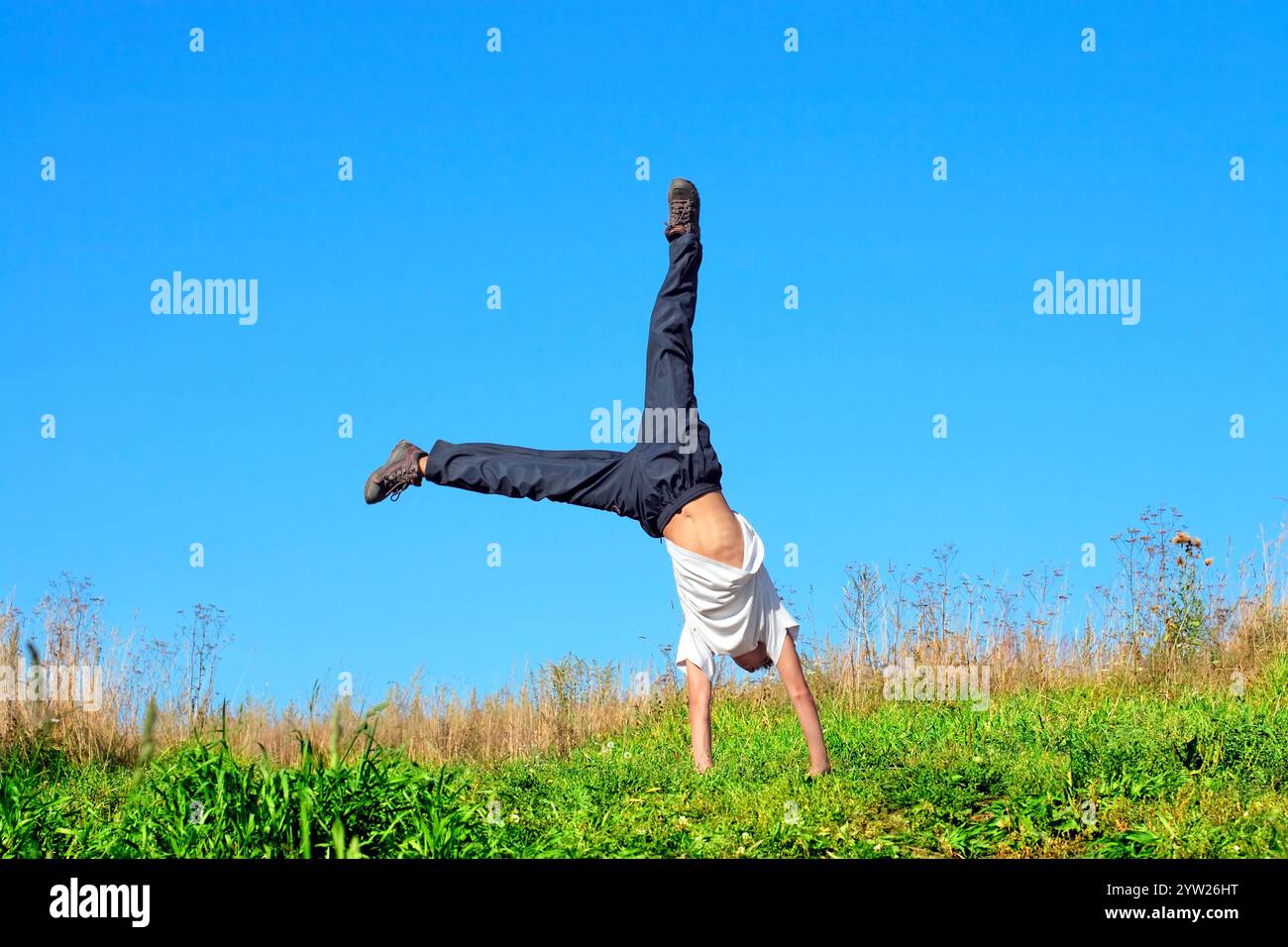 Somersault with legs up hi-res stock photography and images - Alamy