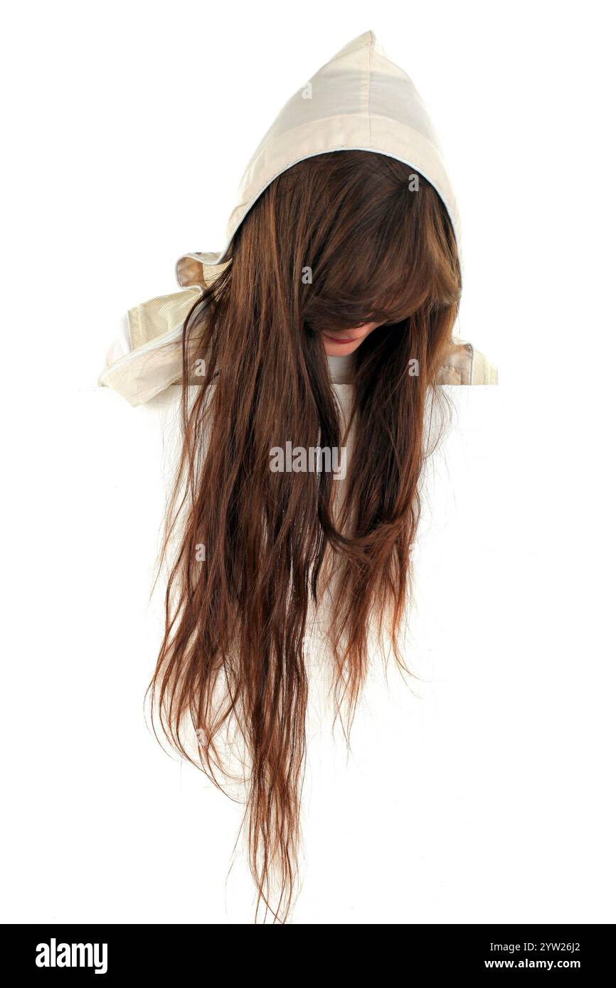 girl with hidden face with long brown hair isolated on the white Stock ...