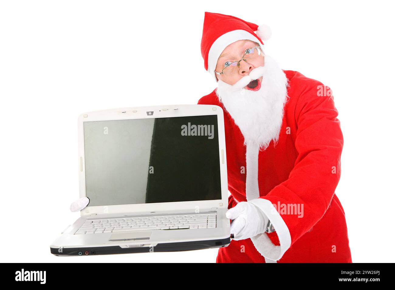 surprised santa claus showing laptop computer with empty screen ...