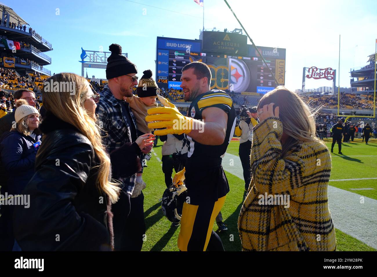 December 8, 2024: T.J. Watt #90 with his wife and J.J. Watt and son ...