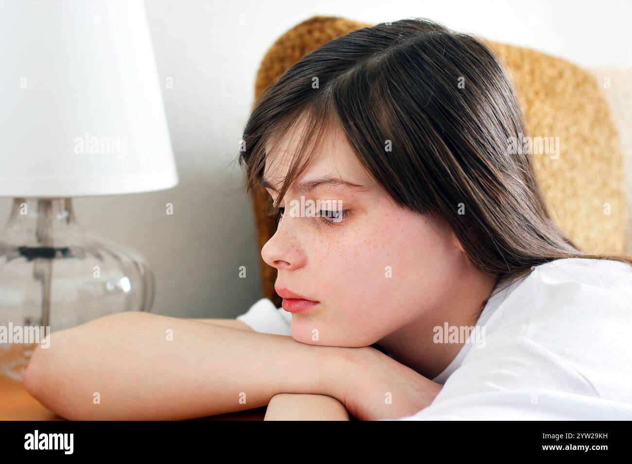Sad Teenage Girl in Home interior Stock Photo - Alamy