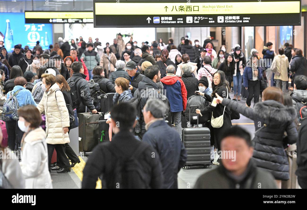 Lots of passengers including foreign tourists come and go through the north-south free passage ...