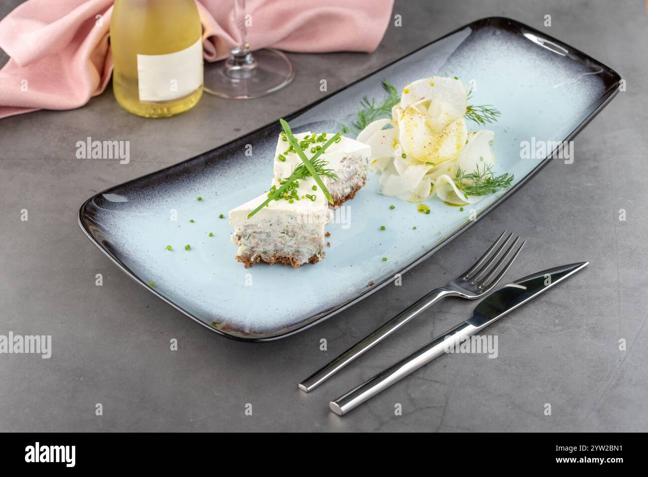 Creamy fish terrine with dill and radish garnish Stock Photo - Alamy