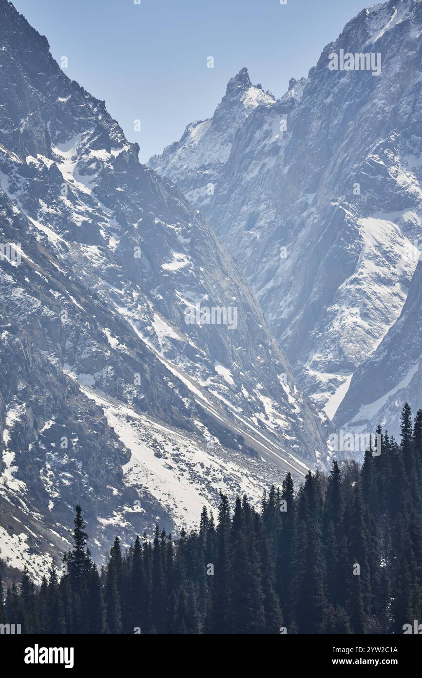 Snowy mountain peaks, rock. Extreme terrain, steep sheer slopes ...