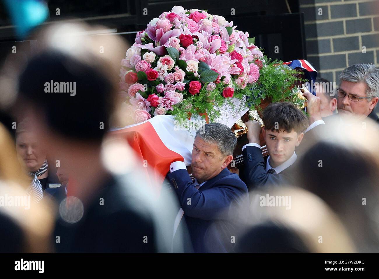 Melbourne, Australia. 09th Dec, 2024. The casket is carried out at the ...