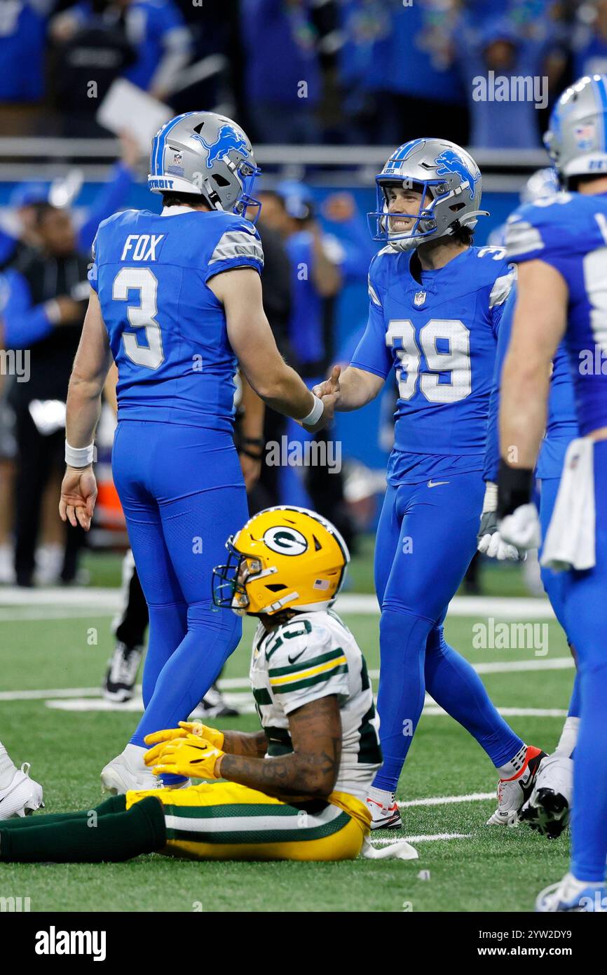 Detroit Lions place kicker Jake Bates (39) celebrates with punter Jack ...